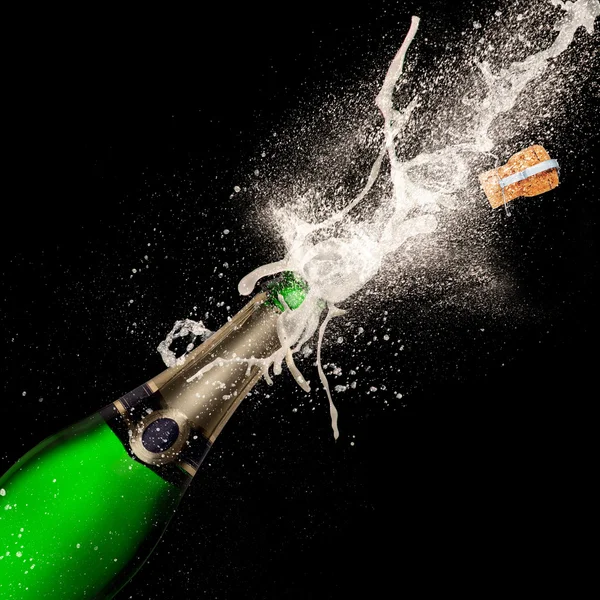 Champagne explosion on black background Stock Photo by ©Kesu01 59204287