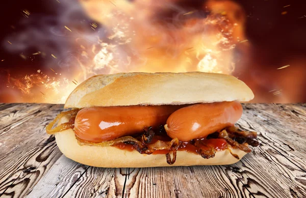 Hot dog on wooden table. — Stock Photo © Kesu01 #67000335