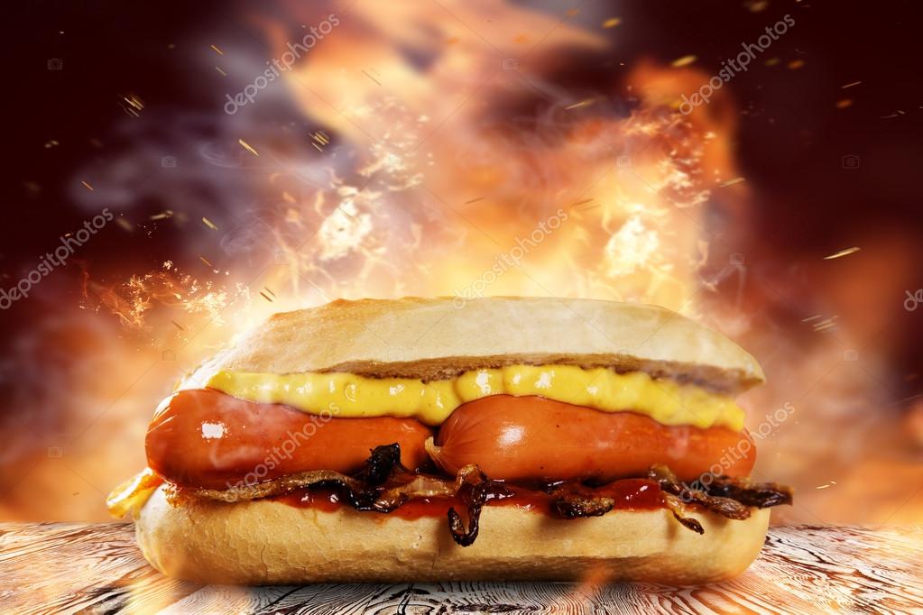 Hot dog on wooden table. — Stock Photo © Kesu01 #67000335