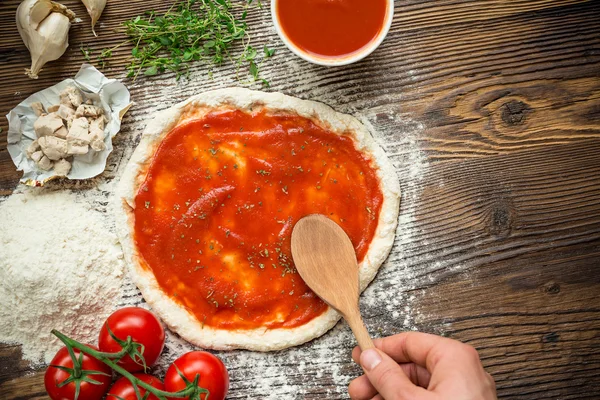 Italian pizza preparation. - Stock Image - Everypixel