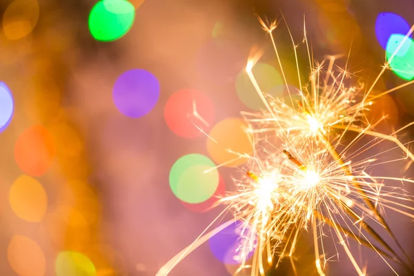 Colorful sparkler, close-up. Stock Photo by ©Kesu01 92325856