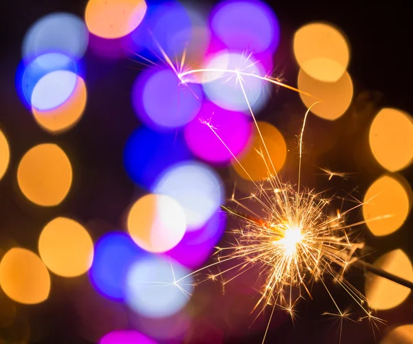 Colorful sparkler, close-up. Stock Photo by ©Kesu01 92325856