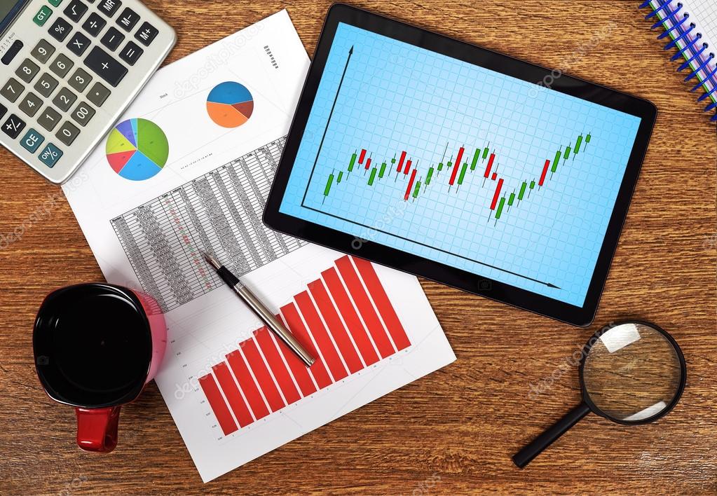 Tablet with stock graph — Stock Photo © vetkit #66788573 Tablet with stock graph — Stock Photo © vetkit #66788573