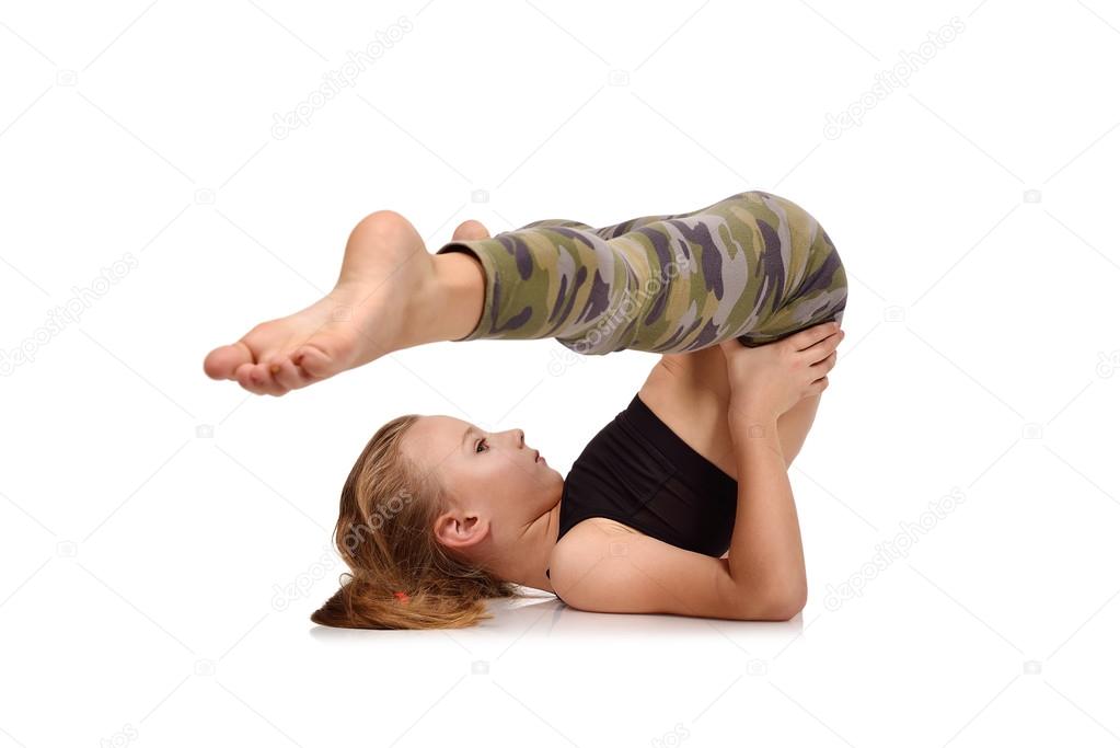 Cute girl does exercise on white background Stock Photo by ©vetkit 90654106