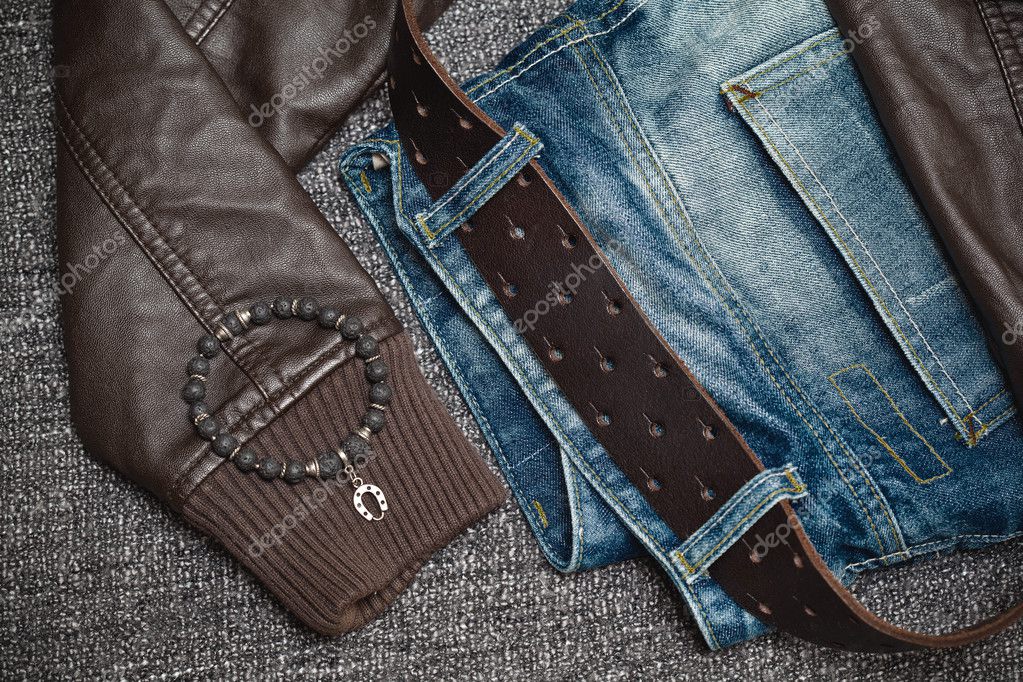 Youth clothes: jeans with a leather belt, leather jacket, jewelry ...