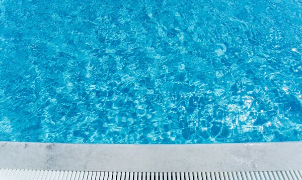 Ripples on the water in the swimming pool. - Stock Image - Everypixel