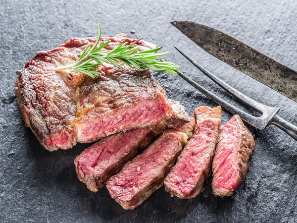 Well-done steak Ribeye. Stock Photo by ©Valentyn_Volkov 110660096