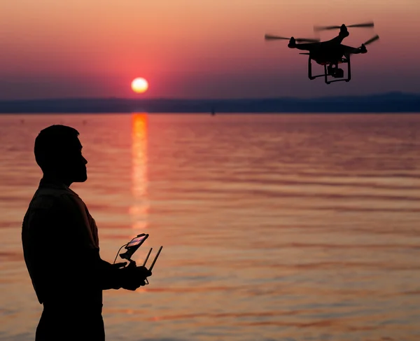 Man holding drone for aerial photography — Stock Photo © apid #127990692