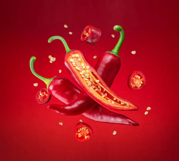 Fresh Red Chilli Peppers Cross Sections Chilli Pepper Seeds Floating ...