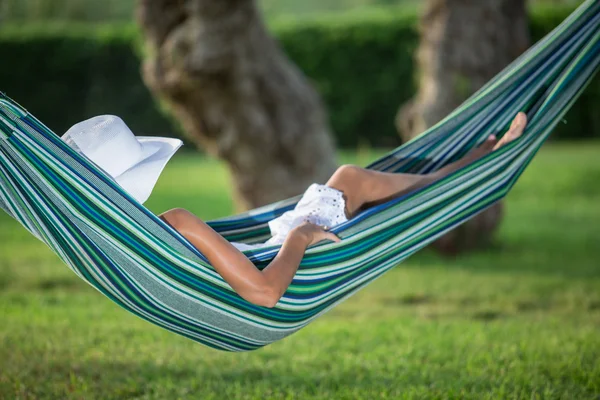 Relaxing in the hammock. Summer day. - Stock Image - Everypixel