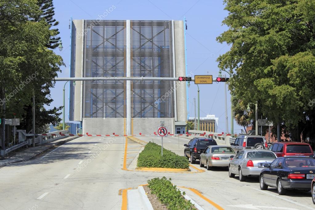 Raised Drawbridge with Vehicles Waiting – Stock Editorial Photo ...