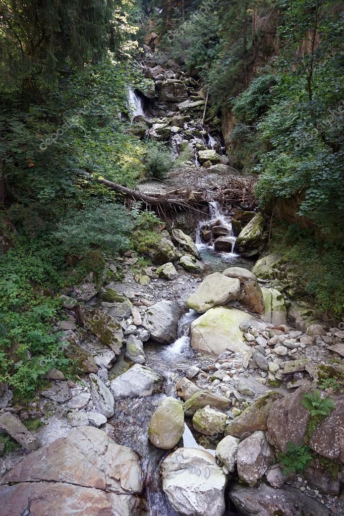 Small river in Swiss Alps ⬇ Stock Photo, Image by © shanin #96228042