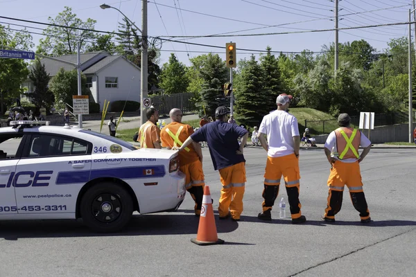 Police and security crew during city summer festival - Stock Image ...