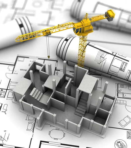 Concrete building construction over blueprints — Stock Photo © mmaxer ...