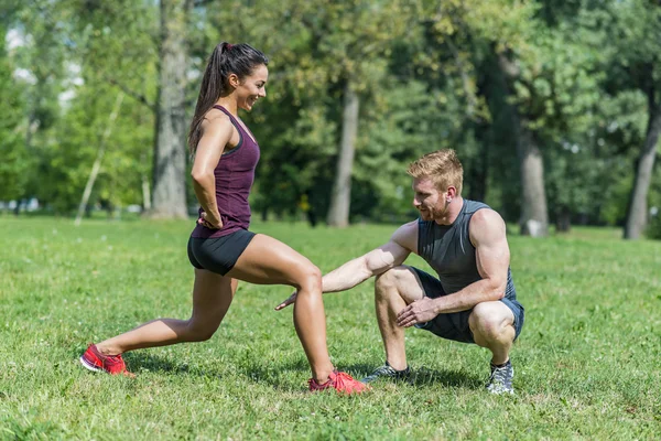 Couple training outdoors - Stock Image - Everypixel