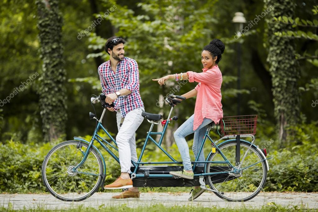 Couple riding on bicycle Stock Photo by ©boggy22 51932765
