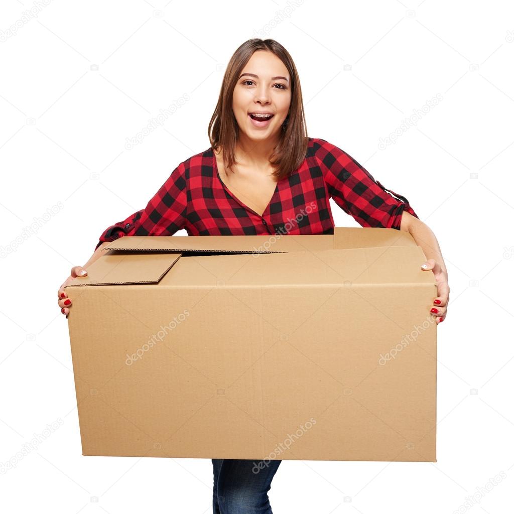 Young woman carrying cardboard box Stock Photo by ©pavel_kolotenko ...