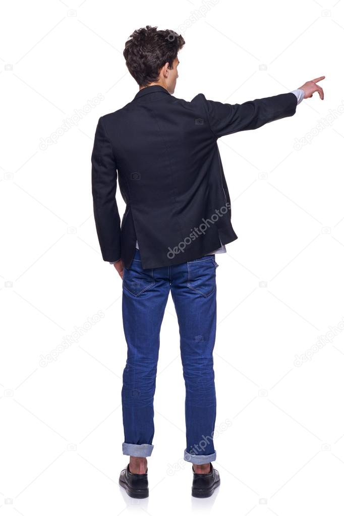 Young man pointing, back view — Stock Photo © pavel_kolotenko #52231789