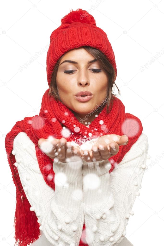 Winter woman blowing snow — Stock Photo © pavel_kolotenko #55594401