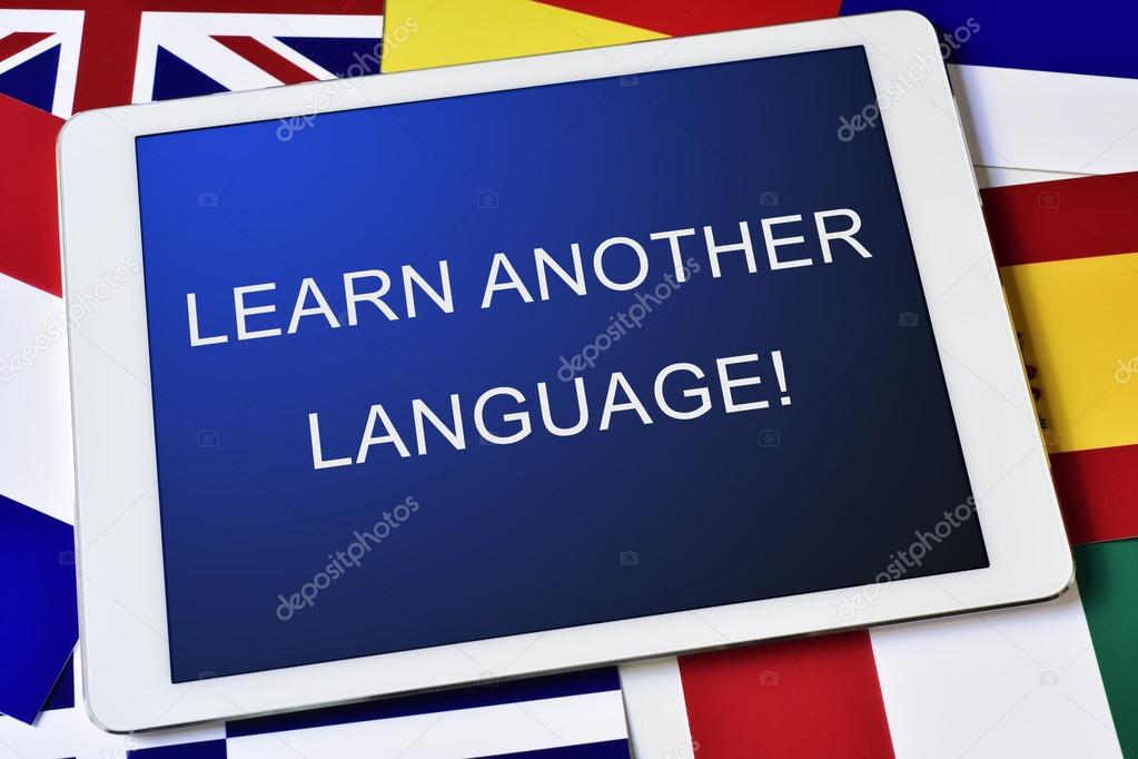 Text learn another language in a tablet computer — Stock Photo ...