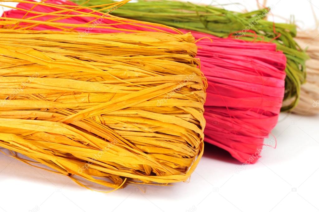 Natural raffia of different colors Stock Photo by ©nito103 59025509