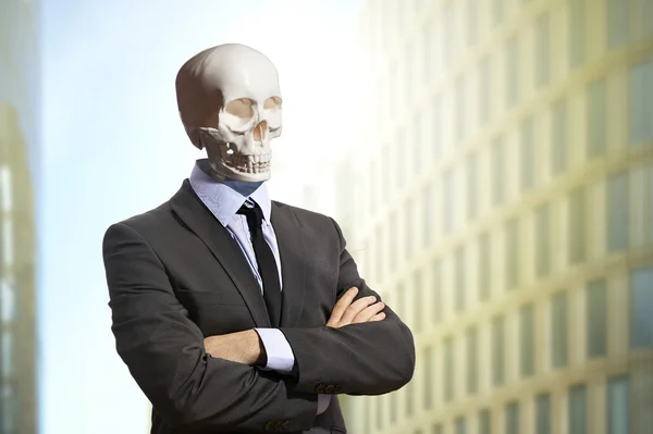 Skeleton in business suit isolated on white Stock Photo by ©be_low 90770776