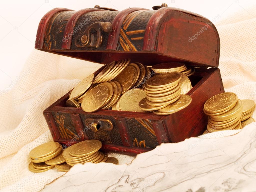 Treasure chest on map Stock Photo by ©ivanmateev 62107675