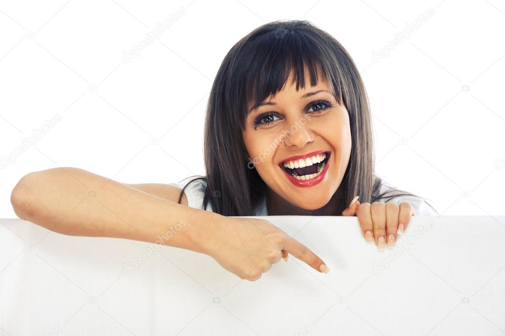 Young woman pointing behind Stock Photo by ©ivanmateev 62152811