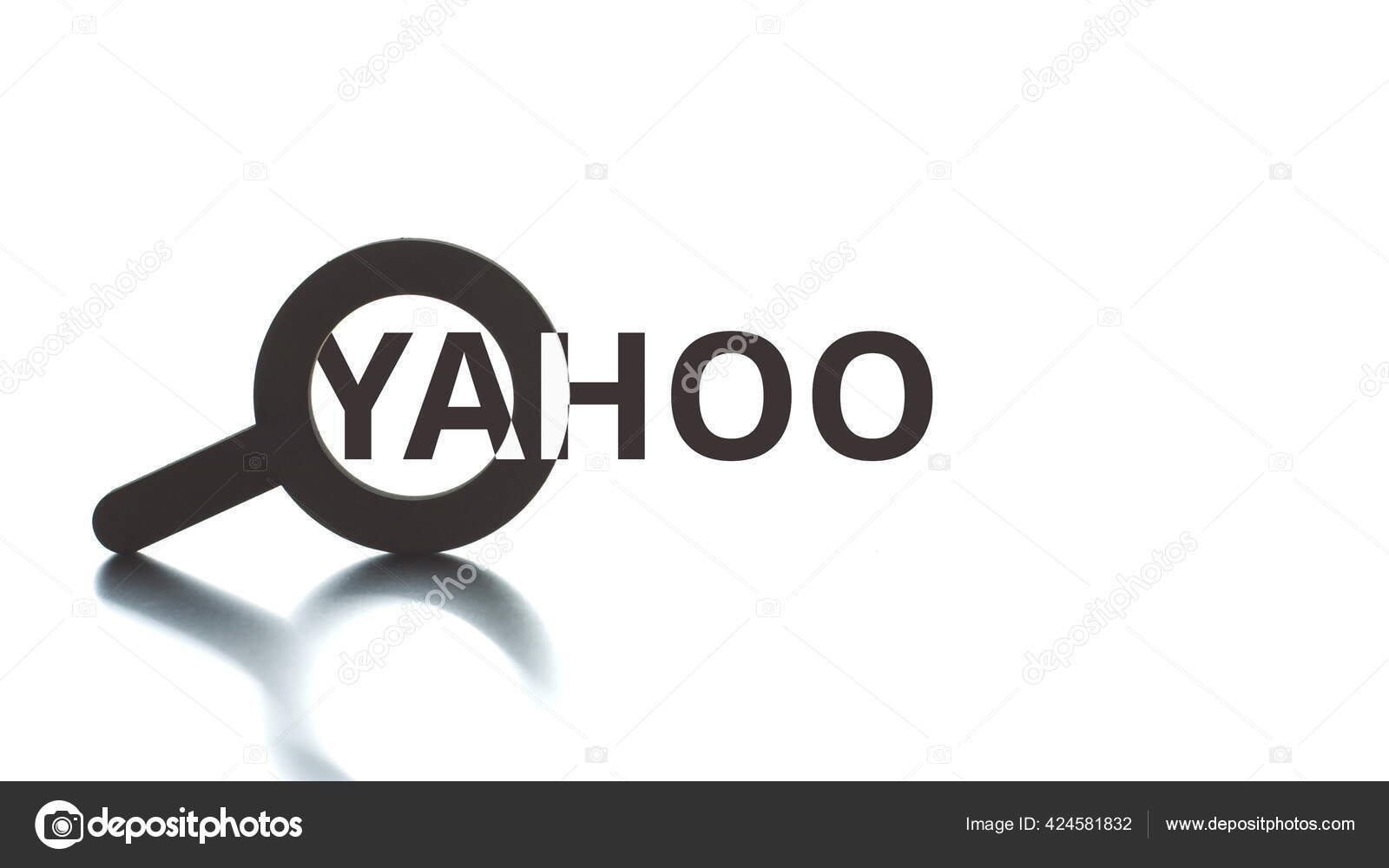 YAHOO text pops up from the loupe icon. Editorial conceptal clip ...