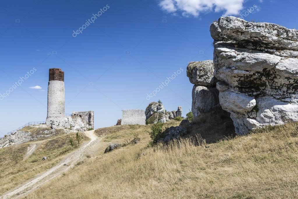 White rocks and ruined medieval castle in Olsztyn, Poland Stock Photo ...