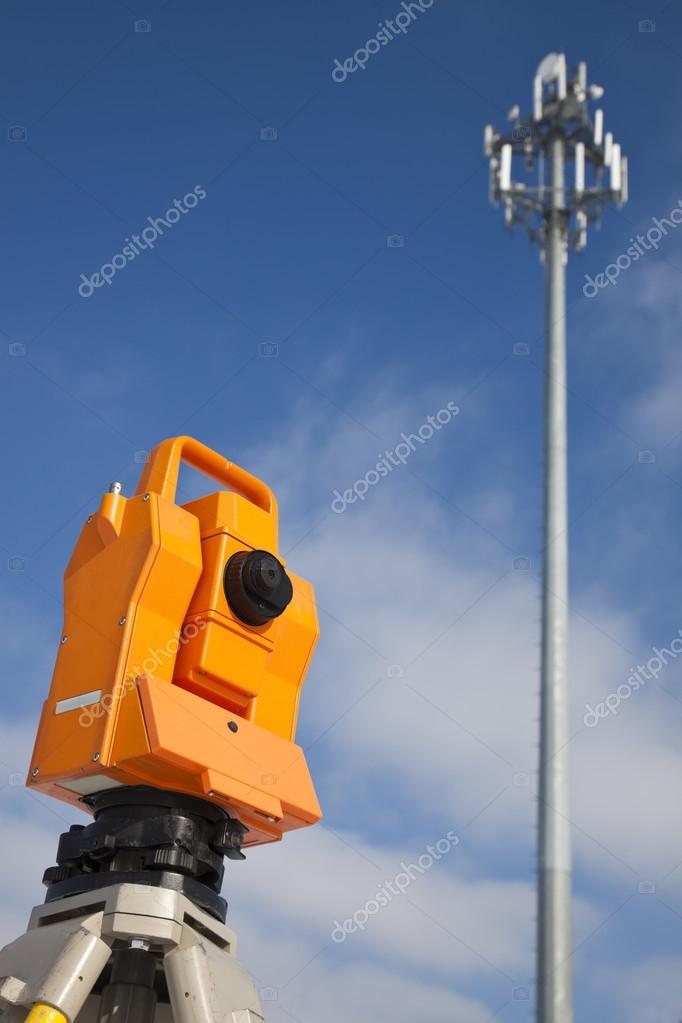 Surveying by cell phone tower — Stock Photo © benkrut #88366310