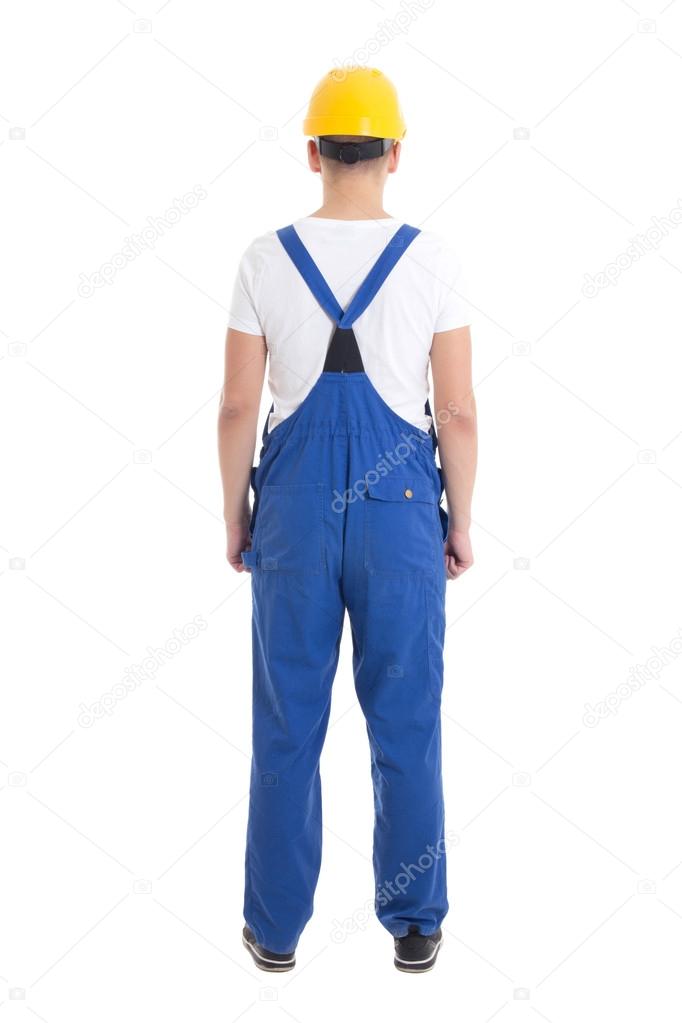 Back view of young man in blue builder uniform isolated on white ...