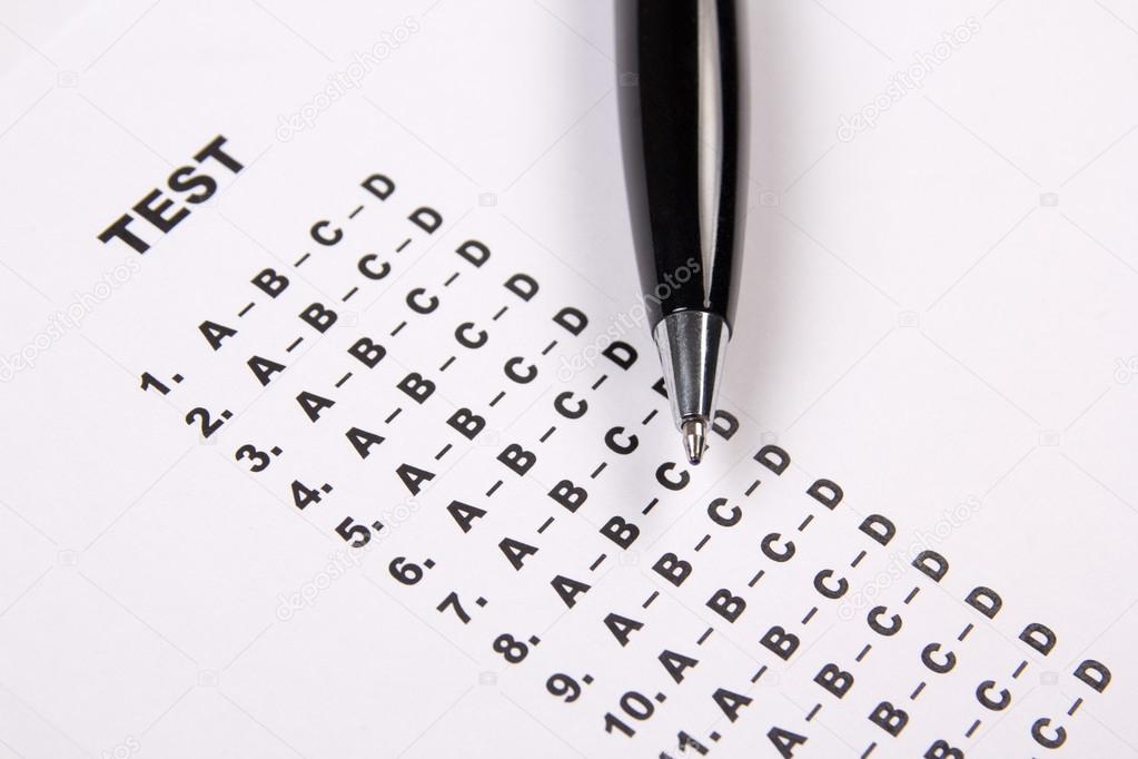 Close up of test score sheet with answers and pen — Stock Photo © Di ...