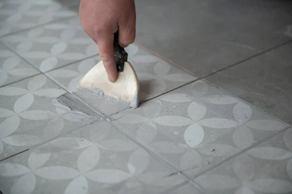 Tiler Laying Ceramic Tile Floor Professional Worker Makes Renovation ...