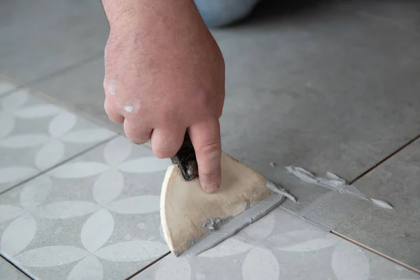 Tiler Laying Ceramic Tile Floor Professional Worker Makes Renovation ...