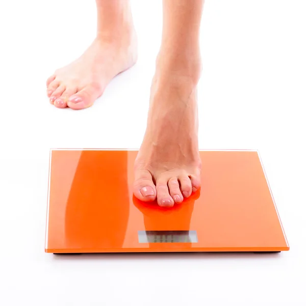 Woman feet on floor scales — Stock Photo © kontur-vid #5147629