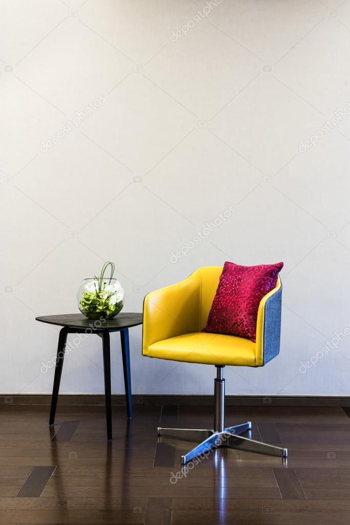 Table Chair combination in front of a plain wall — Stock Photo ...