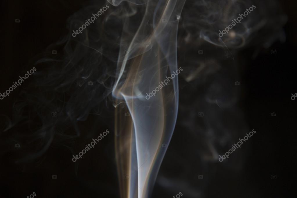 White smoke from aromatic stick Stock Photo by ©Mulikov 103657898