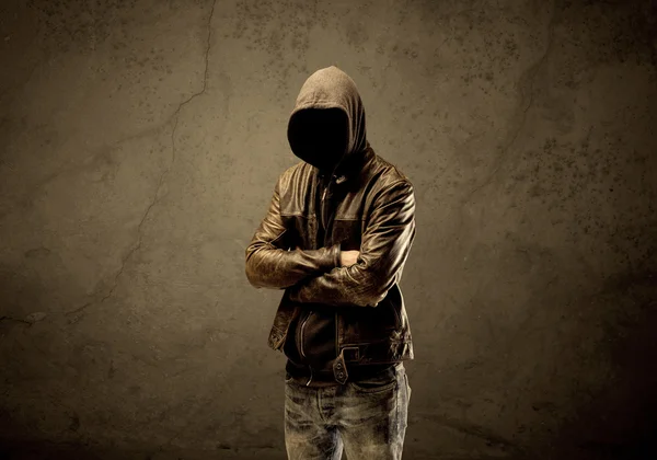Faceless scary man in a hood against a dark background. — Stock Photo ...