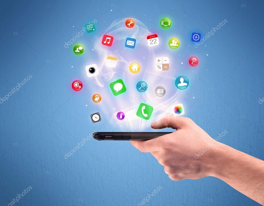 Hand holding tablet phone with app icons — Stock Photo © ra2studio ...