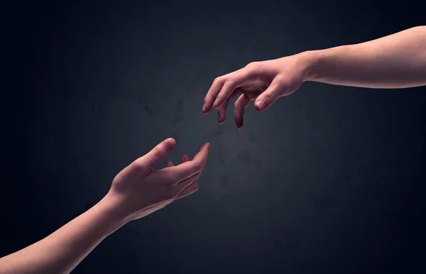 Hand about to touch another one Stock Photo by ©ra2studio 116327592