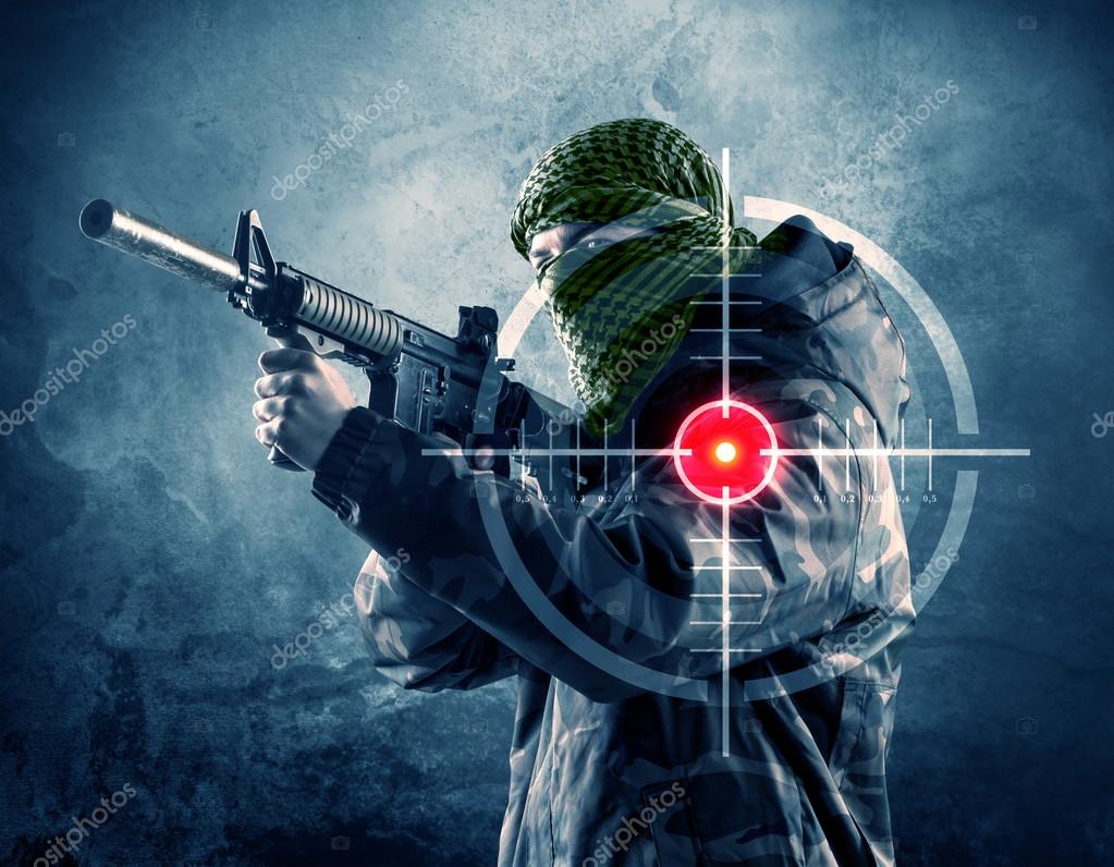 Masked terrorist man with gun and laser target on his body Stock Photo ...