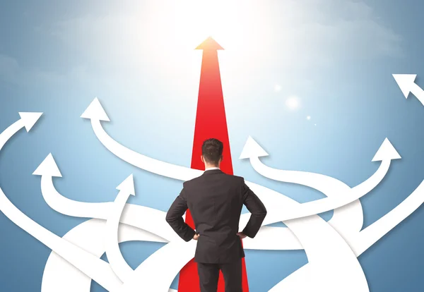 businessman with different direction arrows - Stock Image - Everypixel
