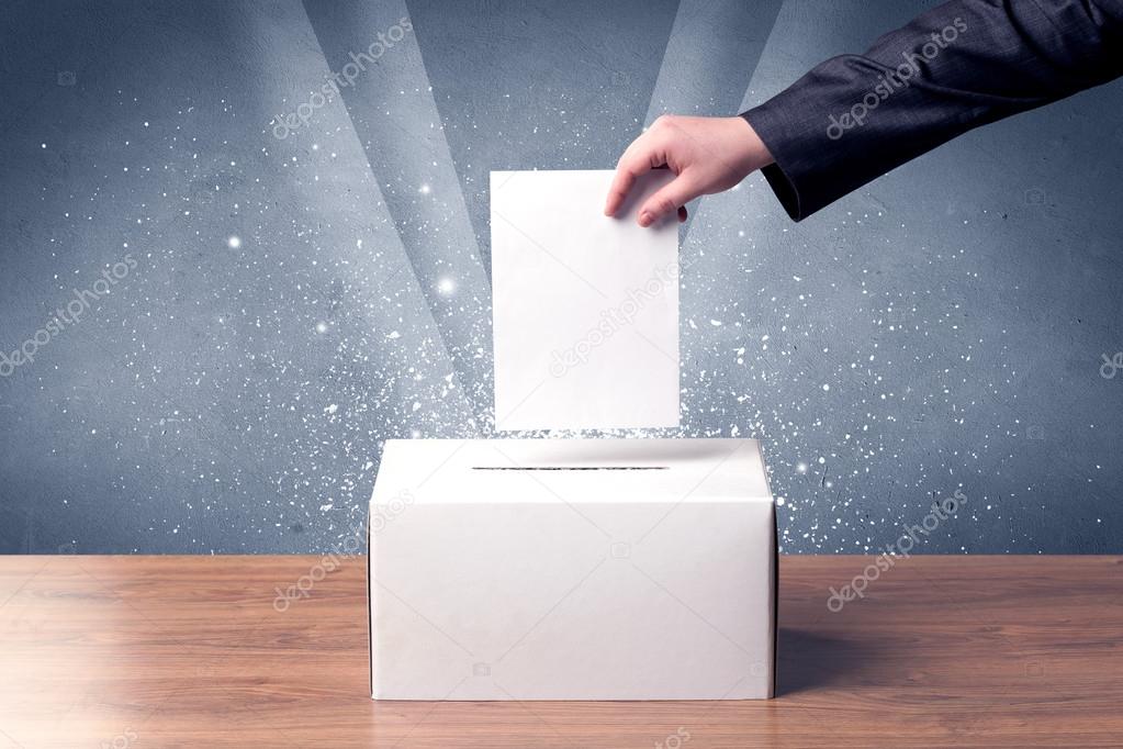Ballot box with person casting vote Stock Photo by ©ra2studio 119278590
