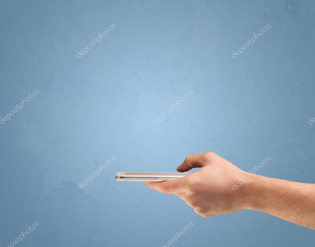 Holding telephone device from profile — Stock Photo © ra2studio #119963204