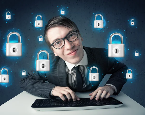 Young hacker with virtual lock symbols and icons Stock Photo by ...