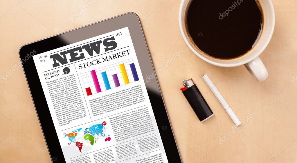 Tablet pc shows news on screen with a cup of coffee on a desk — Stock ...