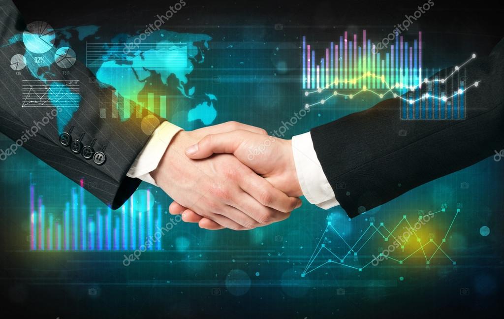 Handshake with diagrams Stock Photo by ©ra2studio 67179327