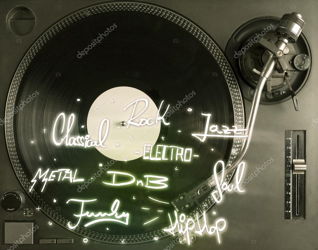 Turntable with vinyl and music genres writen Stock Photo by ©ra2studio ...
