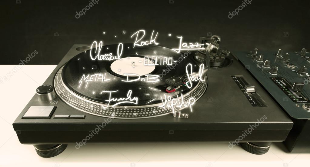 Turntable with vinyl and music genres writen — Stock Photo © ra2studio ...